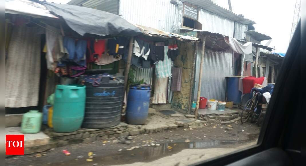 GORAI FOOTPATH TURNING INTO SLUM LANE - Times of India