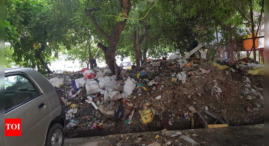 Dumping tutorial near school - Times of India