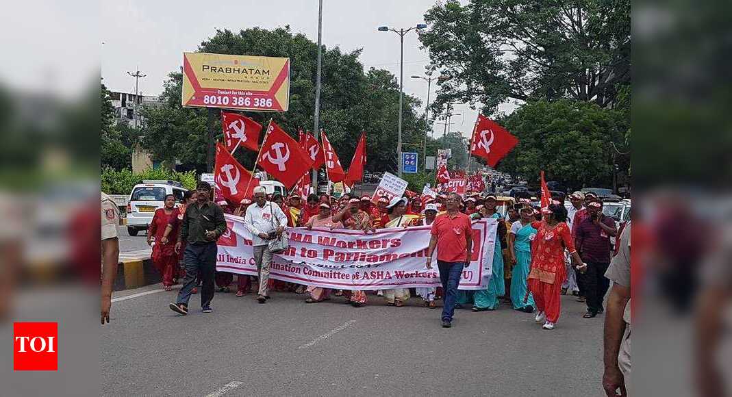 ASHA workers march for better work conditions | Delhi News - Times of India