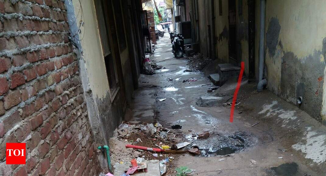 Street full of garbage and sewer water - Times of India