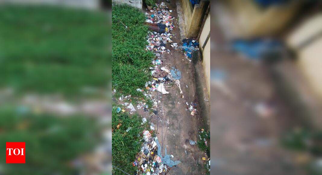 Garbage at posh colony - Times of India