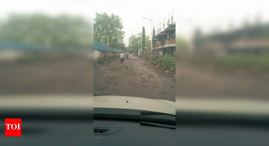 Broken road since 10 years - Times of India