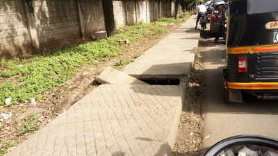 Magarpatta road footpath - Times of India