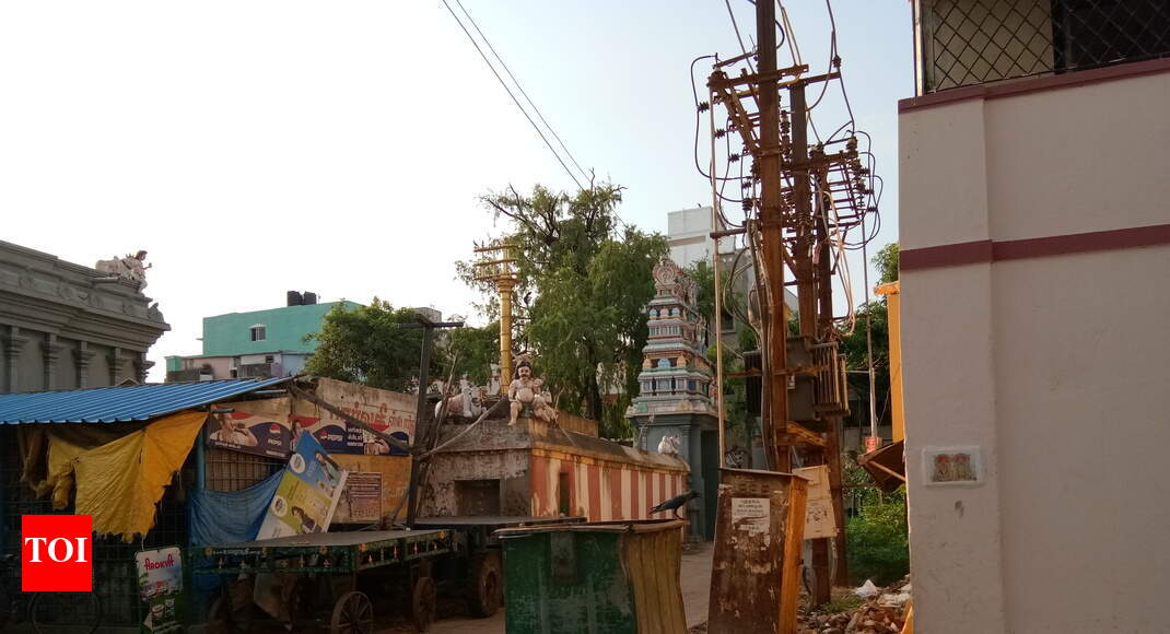 Garbage Piling next to Temple - Times of India