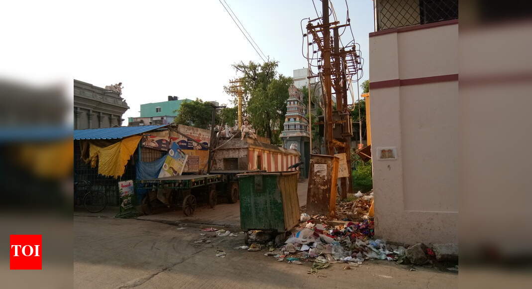 Garbage Piling next to Temple - Times of India