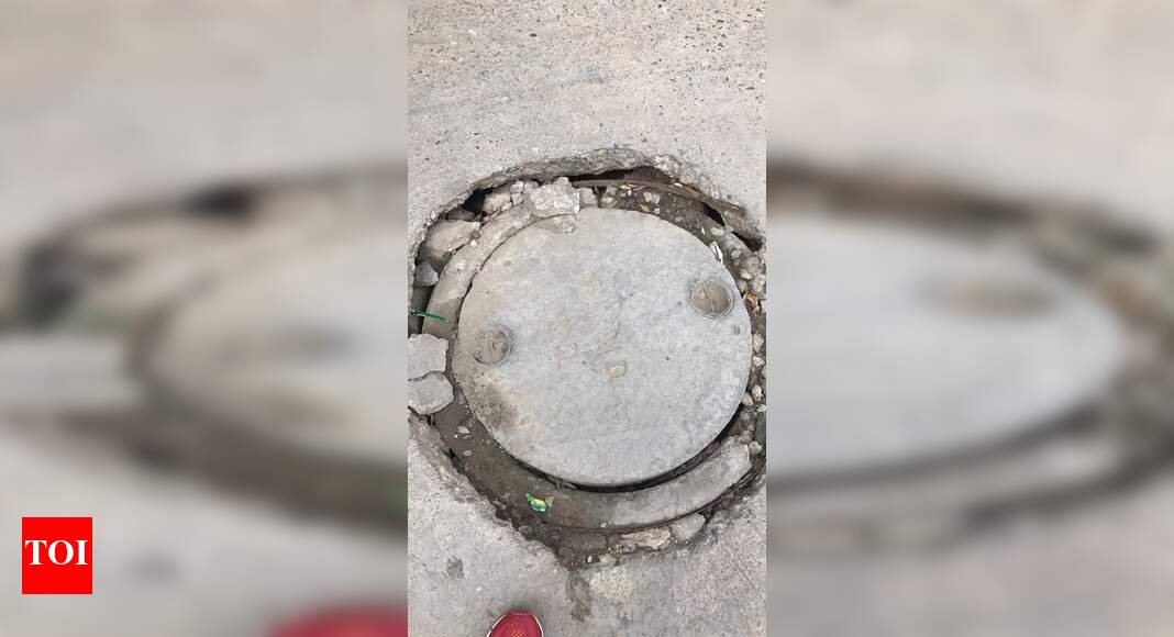 Broken manhole cover - Times of India