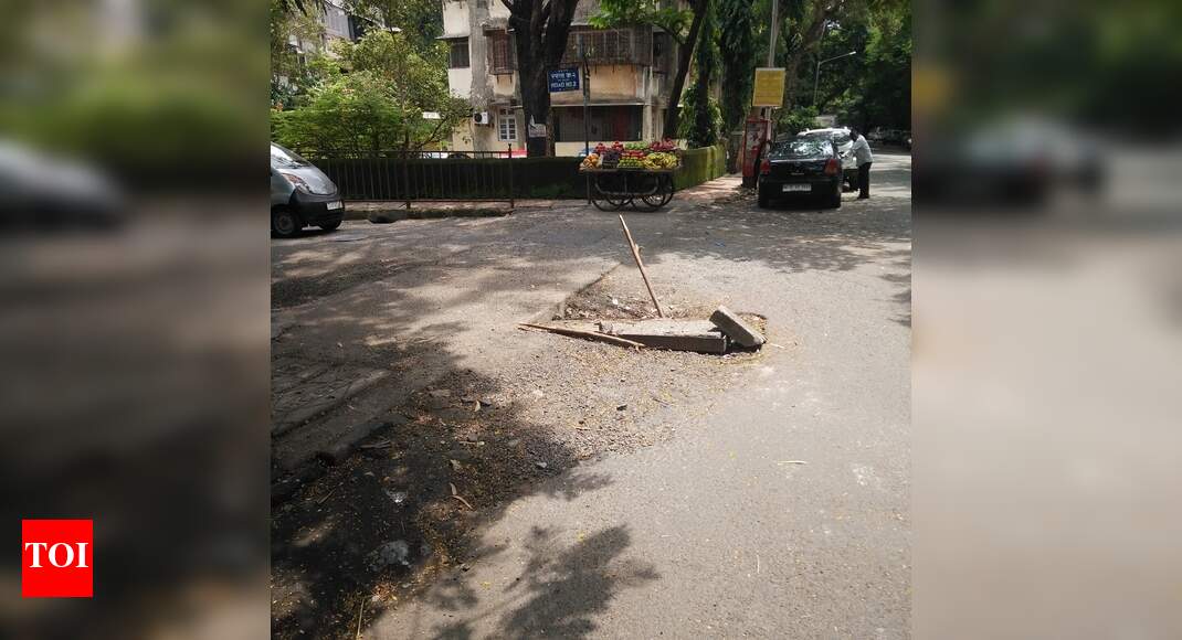 collapsed manhole cover - Times of India