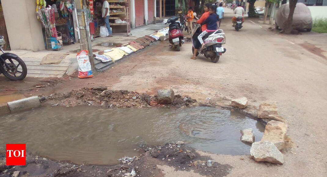 Overflowing drain! - Times of India