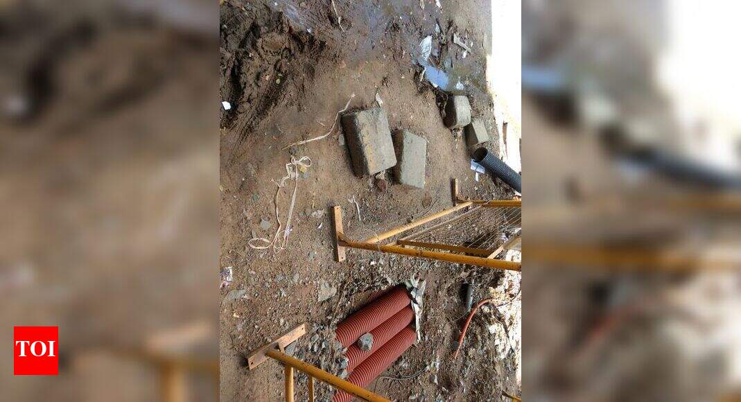 Footpath repair kept pending from one month . - Times of India