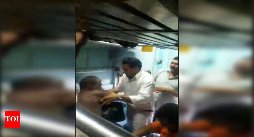 Lawyer Assaults Man: Lawyer assaults poor man in train; video goes ...