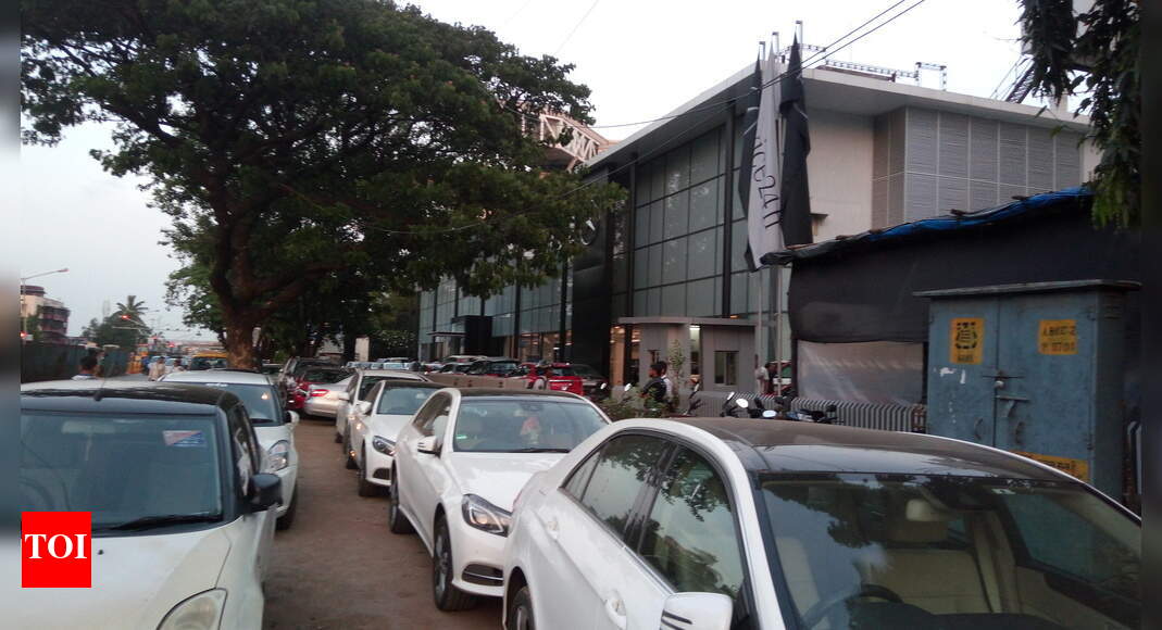 the showroom parks its cars outside - Times of India
