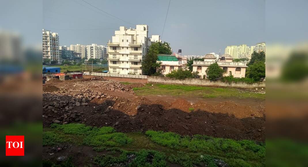 illegal dumping ground - Times of India