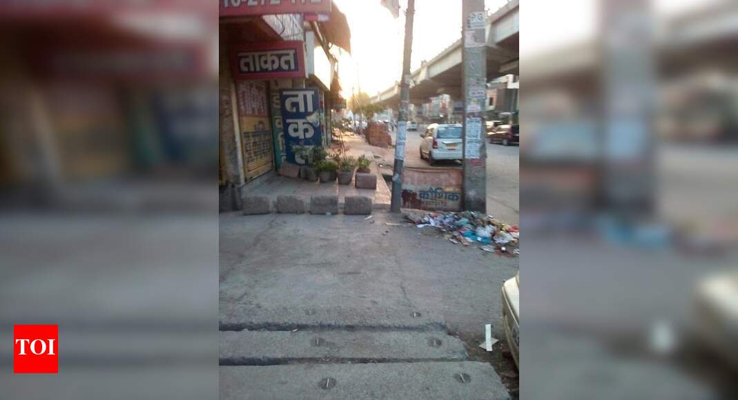 Nobody takes action against blocking footpath - Times of India