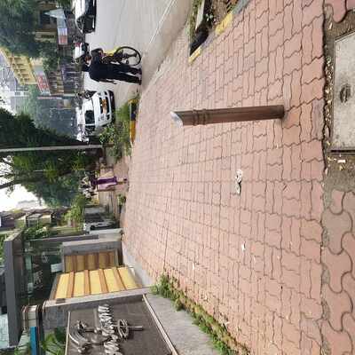 uneven footpath - Times of India