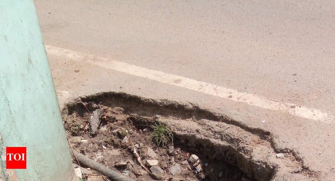 HUGE PIT - Times of India