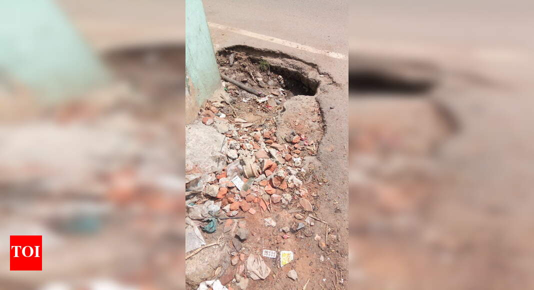 HUGE PIT - Times of India