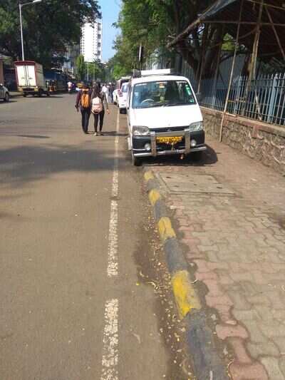 Nowadays, footpaths are made for vehicles to park - Times of India