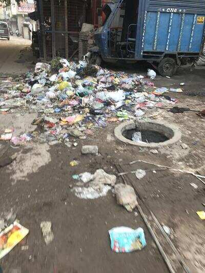 Garbage all over at Anand Parbat - Times of India