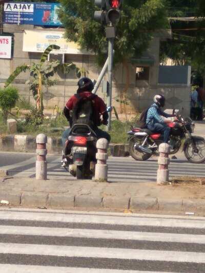 Dangerously crossing divider - Times of India