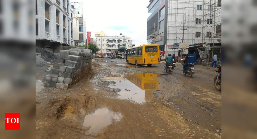 Electronic City Neeladri Road flooded for days - Times of India