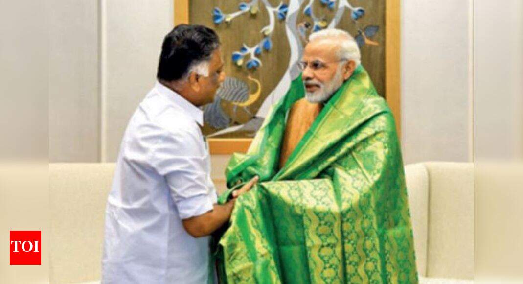 Narendra Modi: OPS meets PM Narendra Modi amid growing discontent in ...