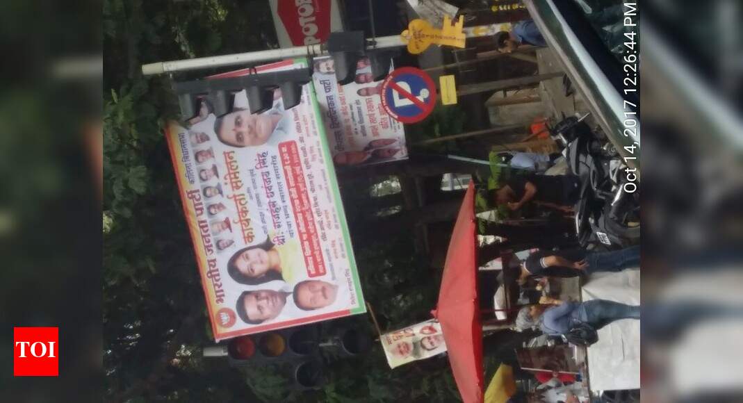 Illegal Political Hoarding - Times of India