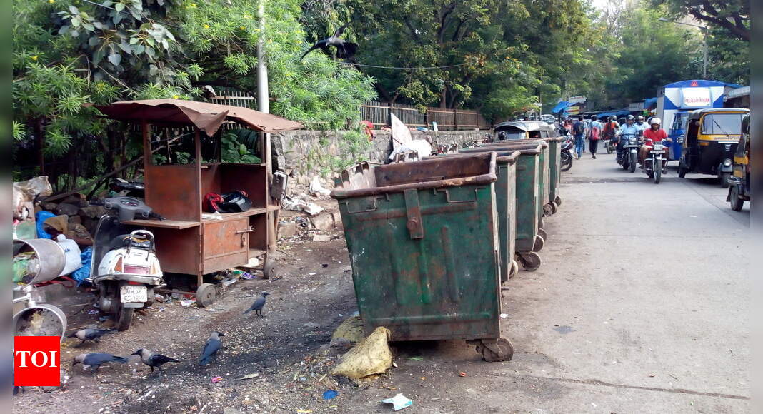 Garbage bin in middle of roads create traffic jam - Times of India