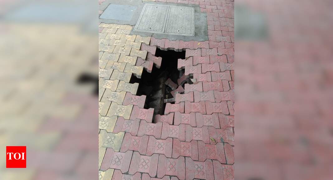 Broken Footpath at Sanpada - Times of India