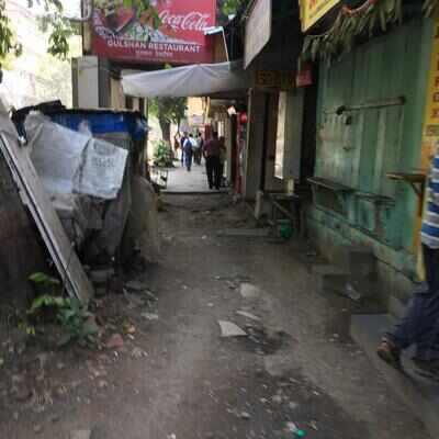 Bad unfinished Foot Path - Times of India