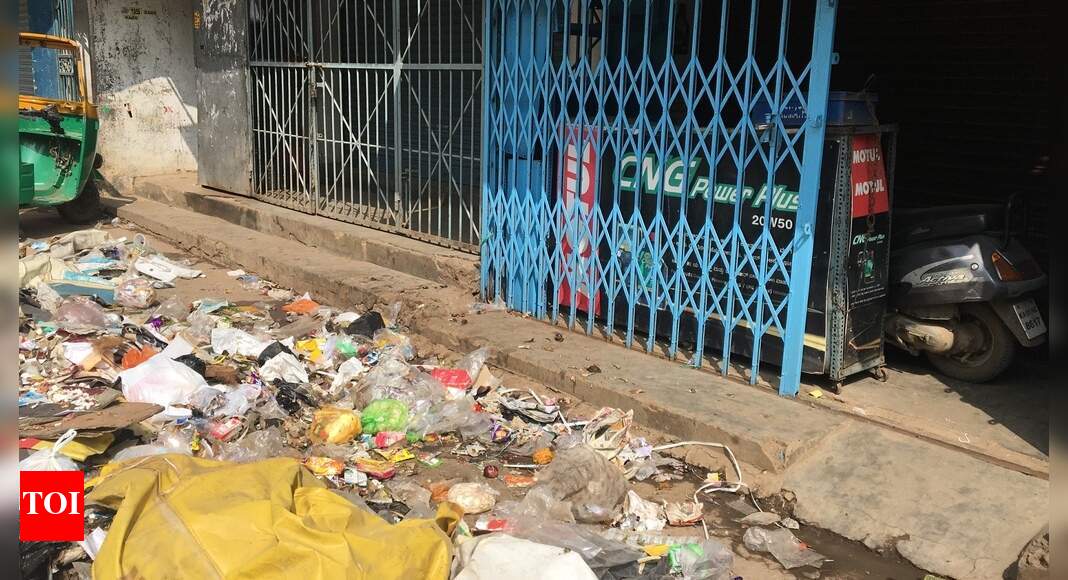 garbage in front of Shop - Times of India
