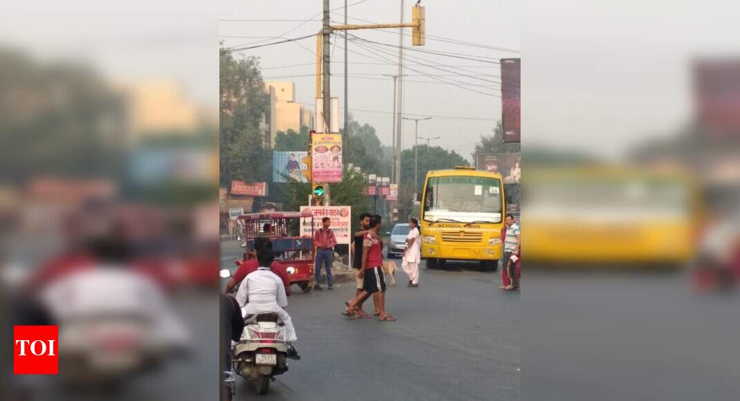 Traffic Signal blocked by hoarding - Times of India