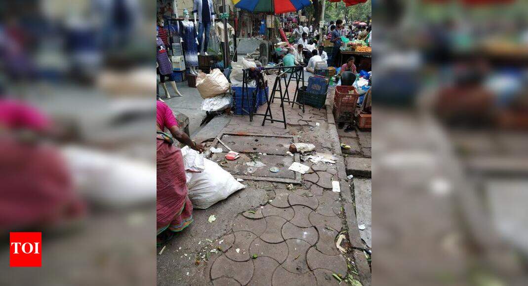 Blocked footpath - Times of India