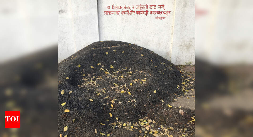 Obstruction on foot-path - Times of India