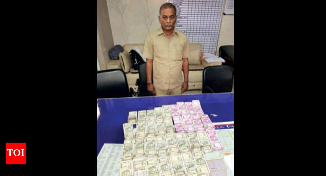 Poll code: Man caught with Rs 30 lakh cash | Ahmedabad News - Times of ...