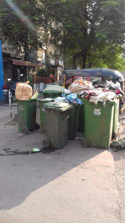 irregular pickup of garbage from ajit glass road - Times of India