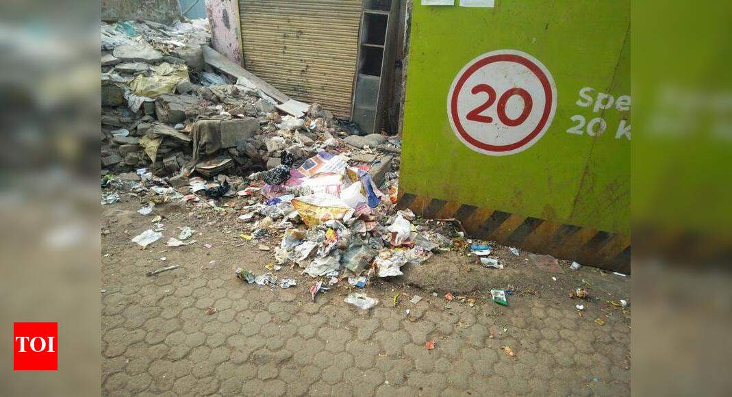 garbage throwing - Times of India