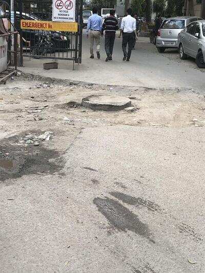 Protruding manhole - Times of India
