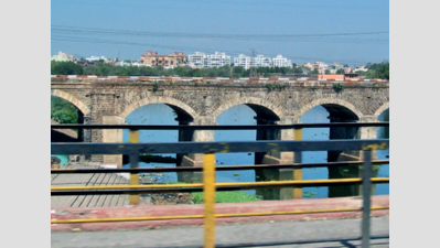 Woman jumps off Harris bridge with son | Pune News - Times of India