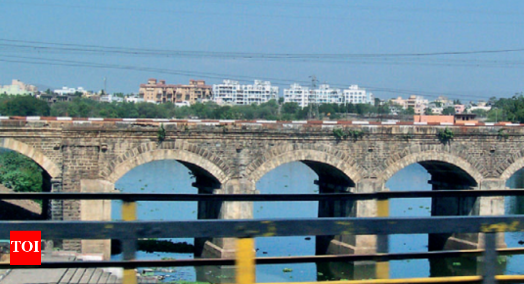 Woman jumps off Harris bridge with son | Pune News - Times of India
