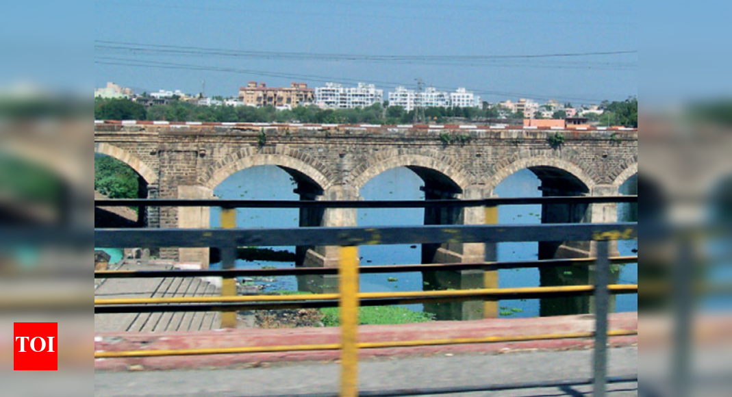 Woman jumps off Harris bridge with son | Pune News - Times of India