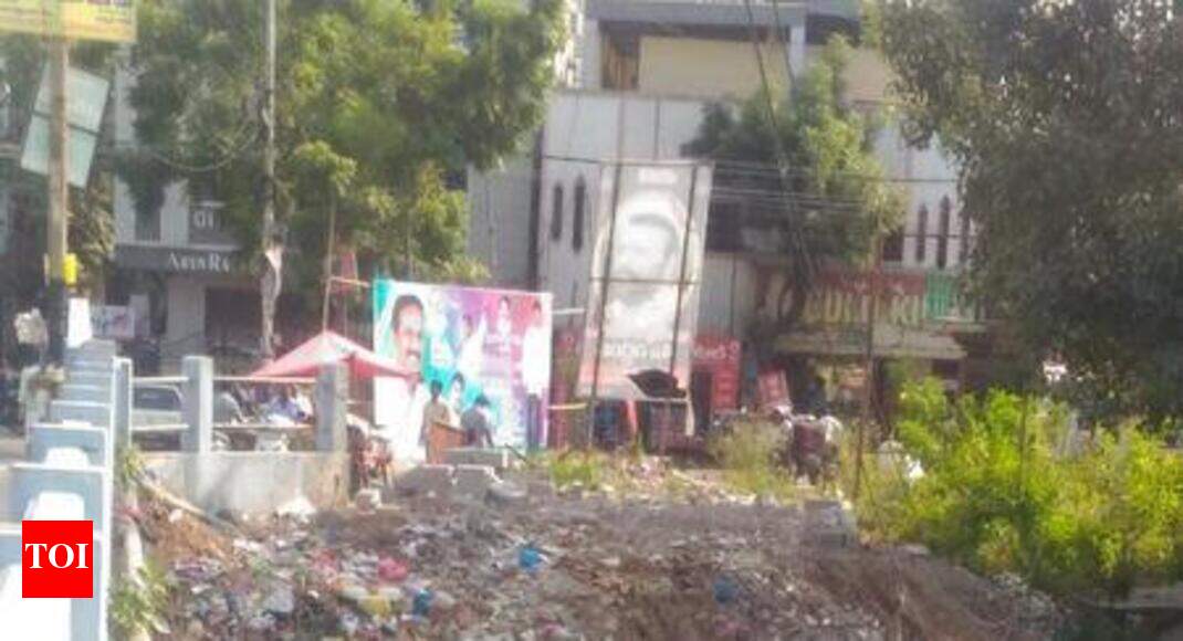 Canal bund filled with garbage - Times of India