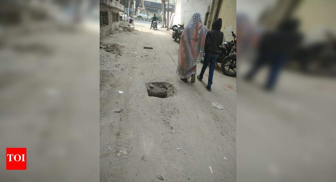 Open manhole, sewer overflow - Times of India