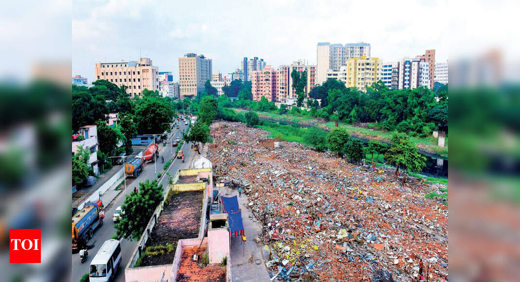 Slum razed, but debris lines Greams Road | Chennai News - The Times of ...