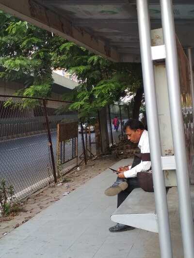 ST BUS. STOP BEHIND IRON MESH - Times of India