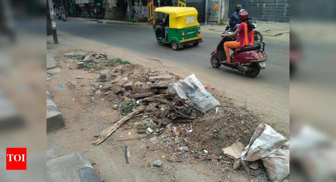 Dangerous Footpath/ Road Condition - Times of India