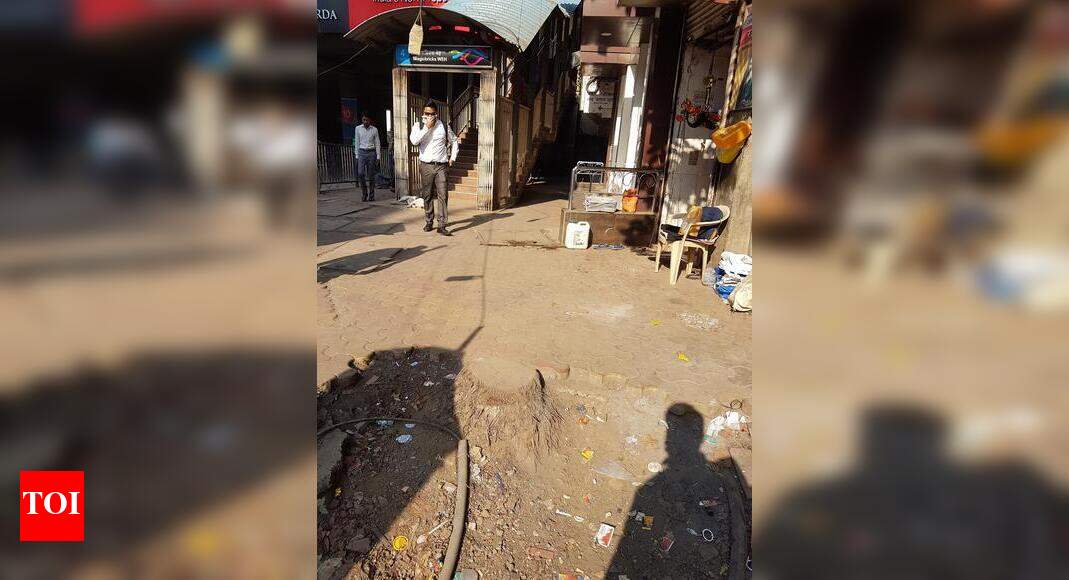 uneven footpath - Times of India