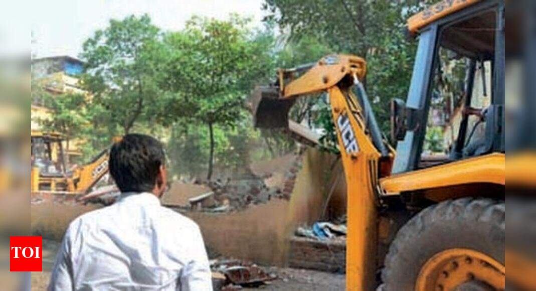 Many illegal structures razed as Cidco, civic body, MIDC conduct day ... Many illegal structures razed as Cidco, civic body, MIDC conduct day ...
