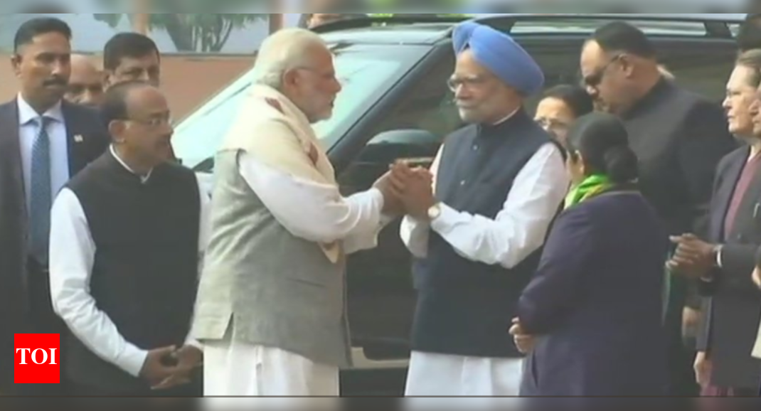 Narendra Modi: Awkward? PM Modi meets Manmohan Singh, days after ...