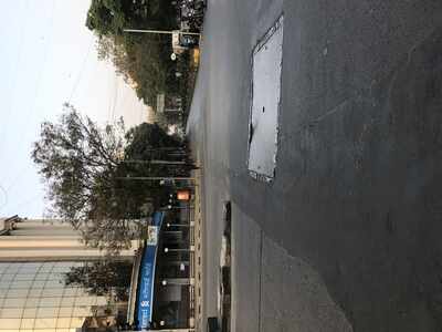 Depression in road at. busy junction - Times of India