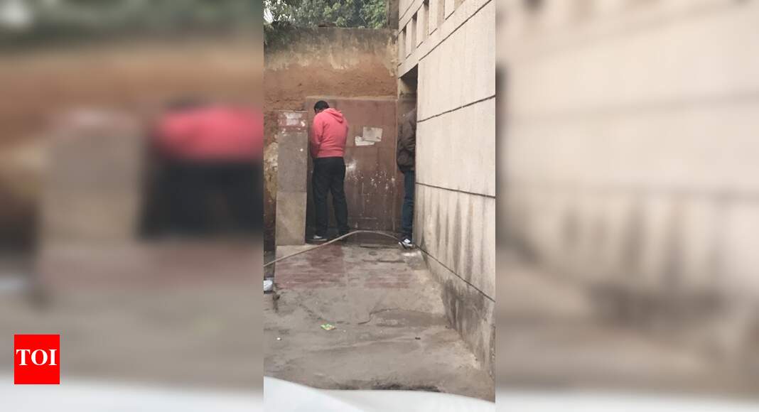 Missing loo creates a stink - Times of India
